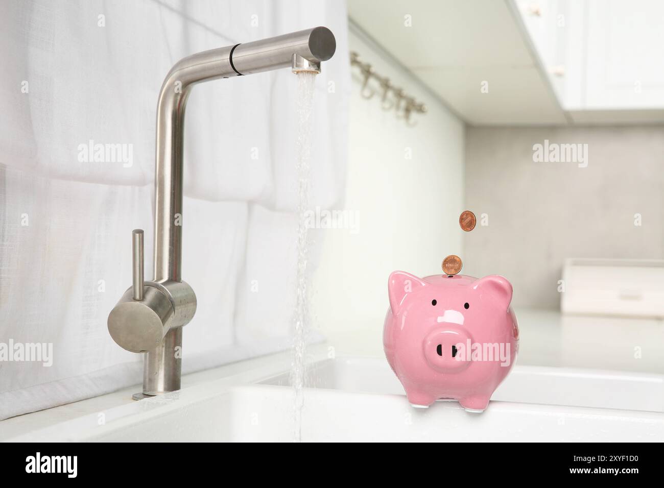 Water saving concept. Coins falling into piggy bank and stream of water ...