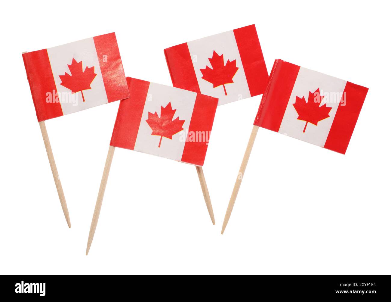 Small paper flags of Canada isolated on white Stock Photo - Alamy