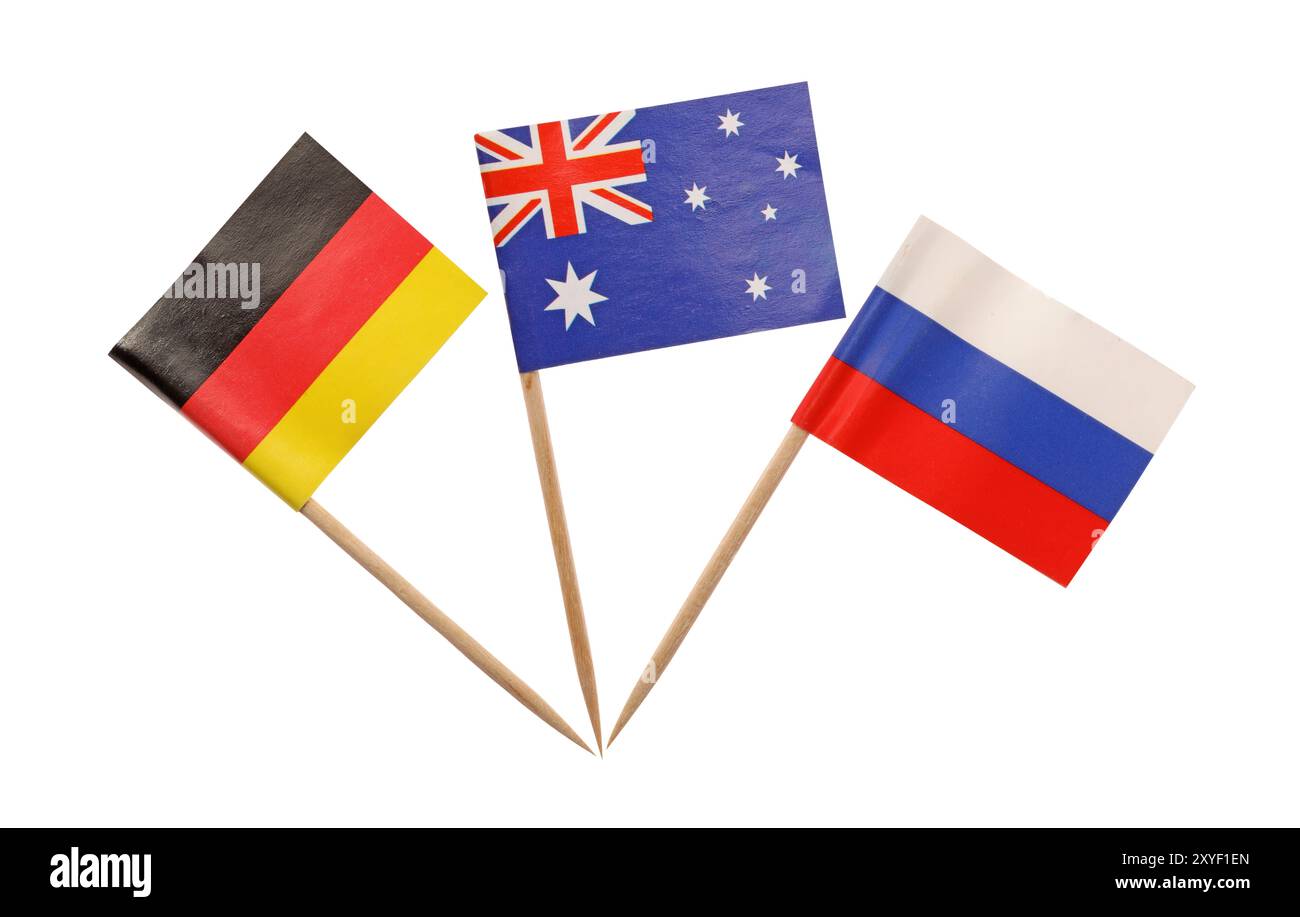Small paper flags of Russia, Australia and Germany isolated on white ...