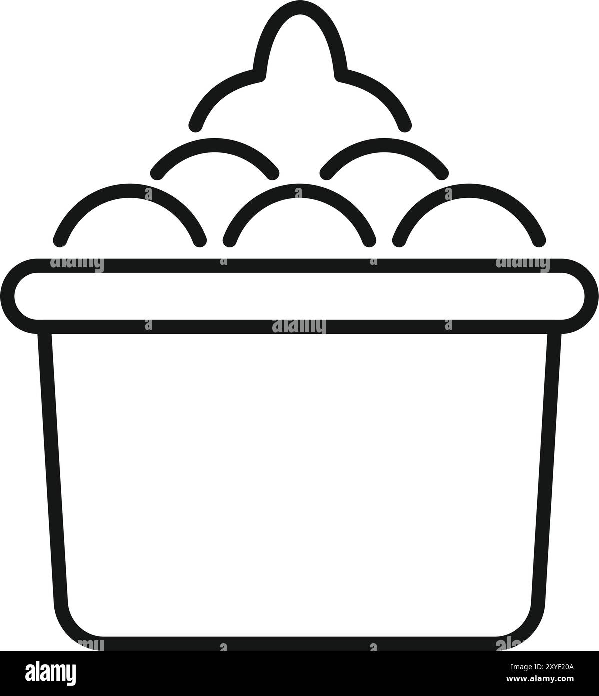 Laundry basket overflowing with clothes soaking, waiting for the ...