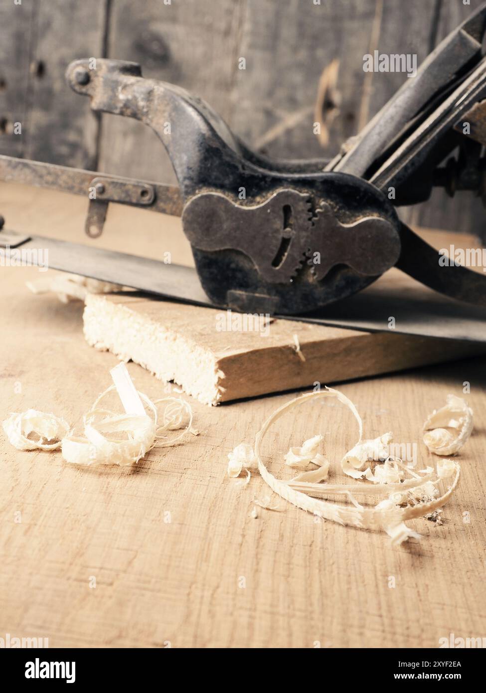 Old used wood plane on a work bench using as traditional wood working ...