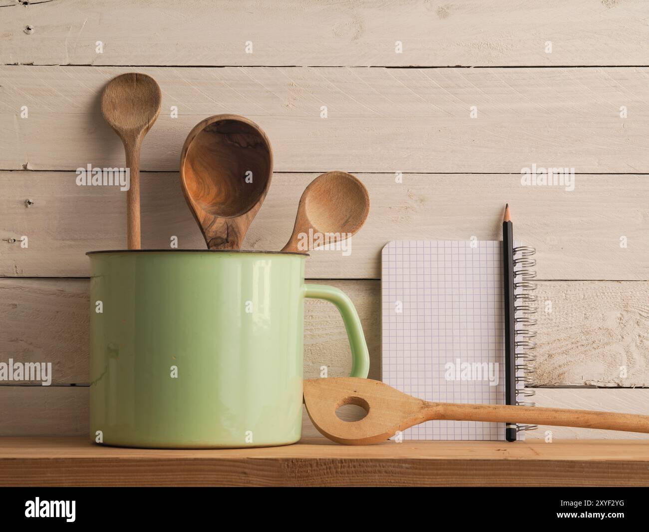 Home kitchen still life, old vintage wooden cooking spoons on white ...