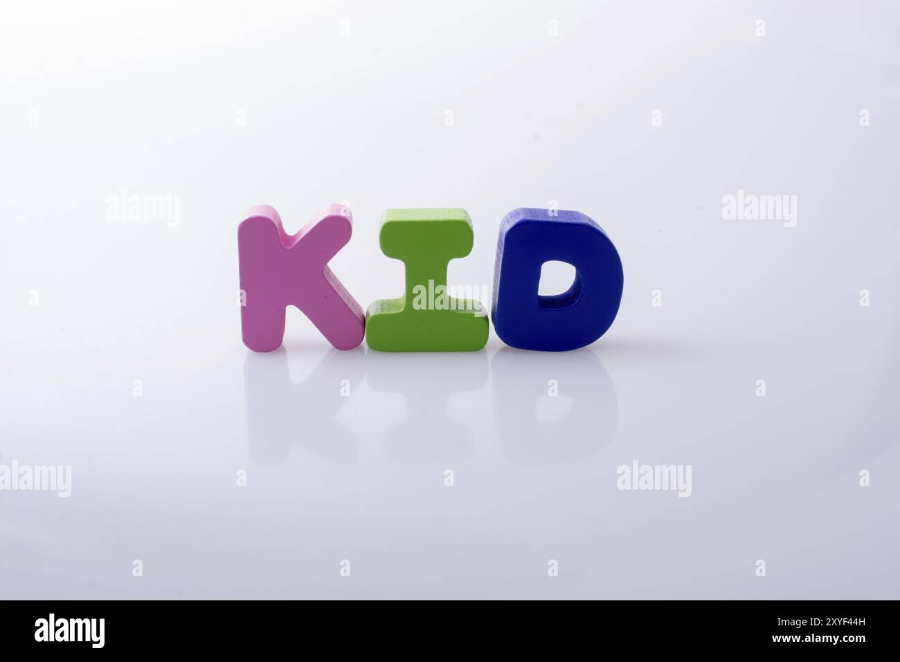 The word KID written with colorful letter blocks on white Stock Photo ...