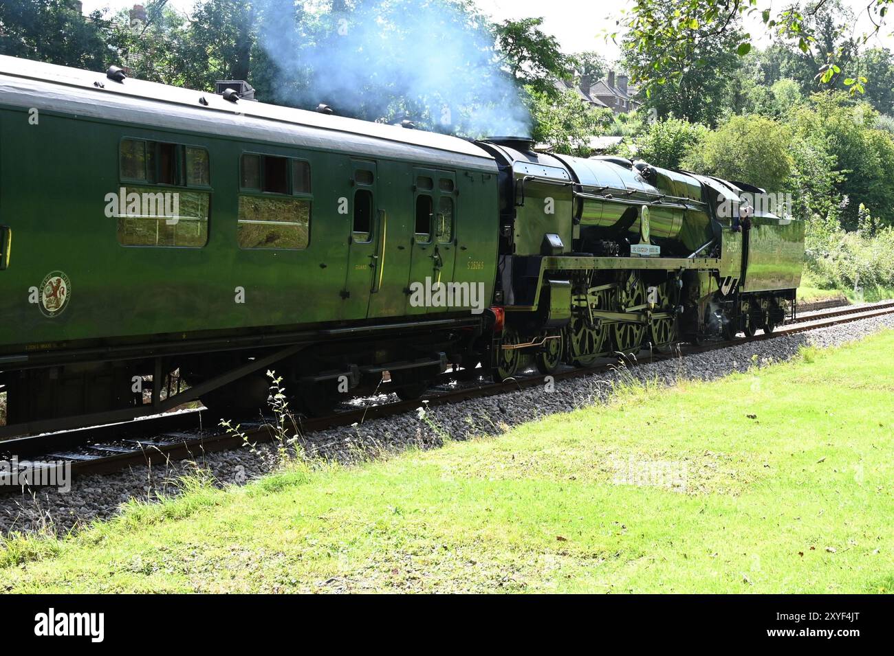 A Battle of Britain class locomotive on The Bluebell railway. water ...