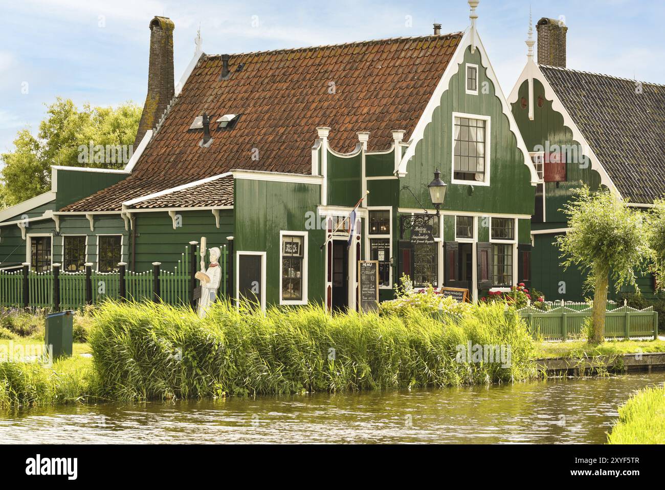 Koog aan de Zaan, Netherlands. July 2022. Traditional wooden facades in ...