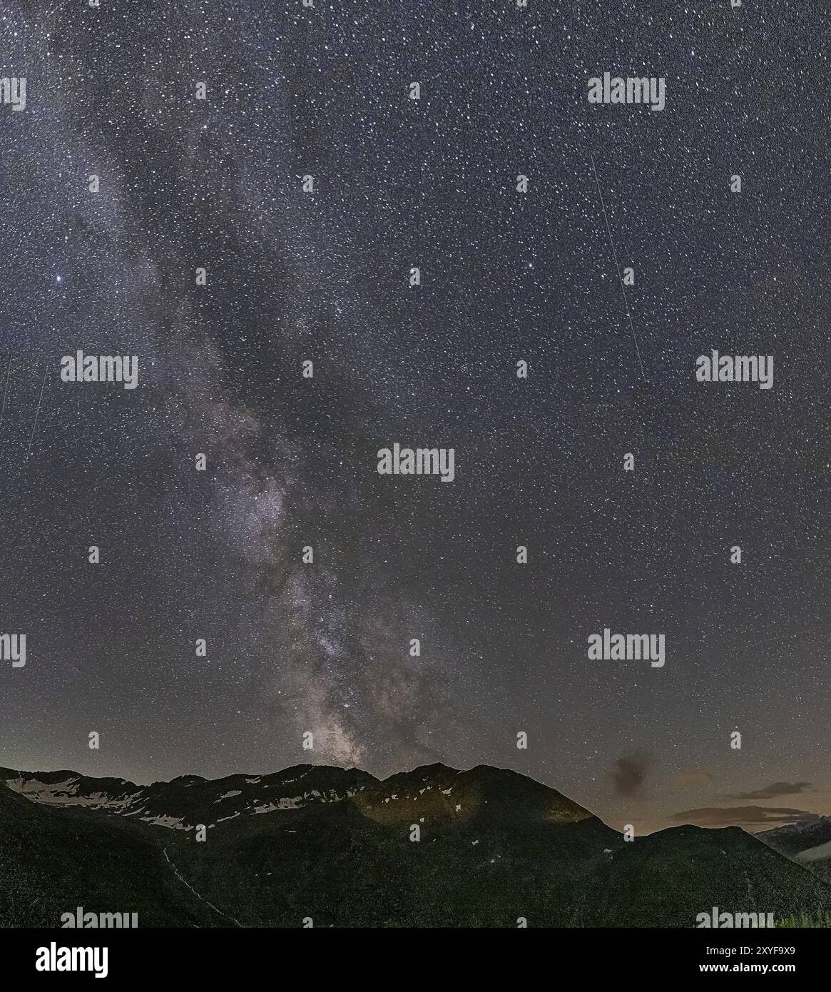 Nocturnal starry sky over the Furka Pass in the Swiss Alps. The night ...