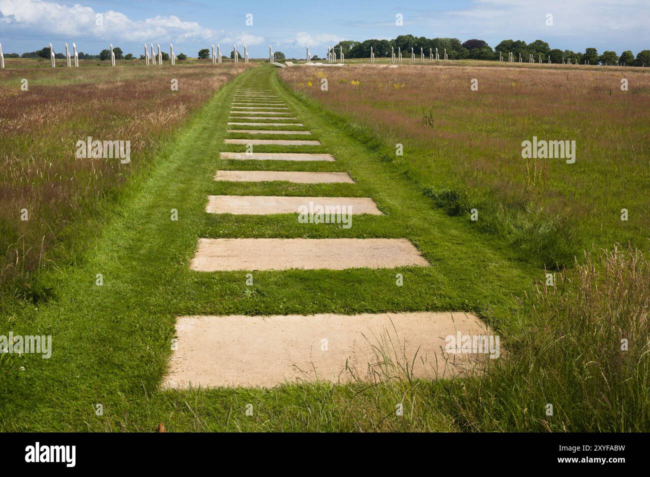 path with concrete slabs leading to palisade in monument area at ...