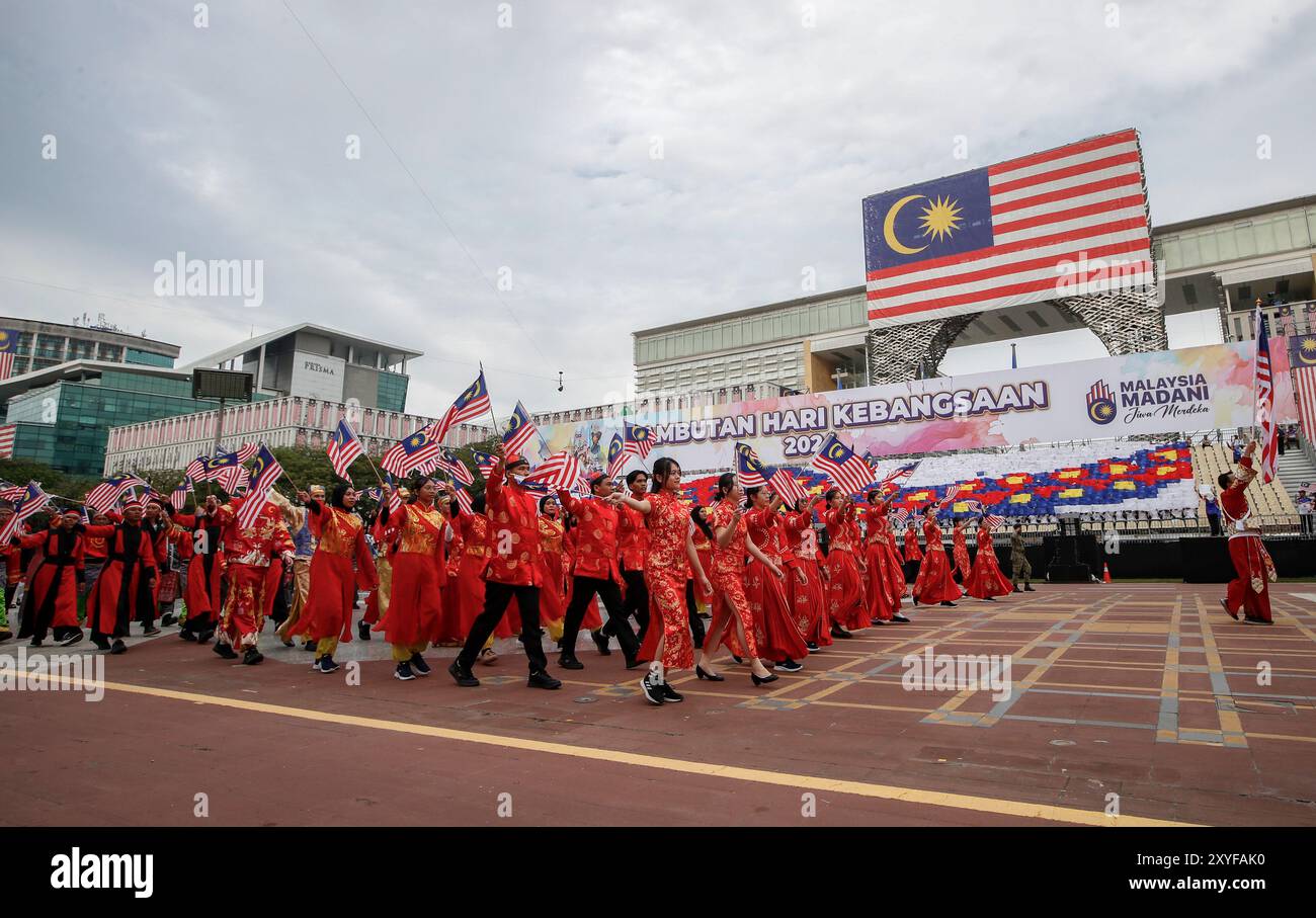 Kuala Lumpur, Malaysia. 29th Aug, 2024. Multiracial participants march ...