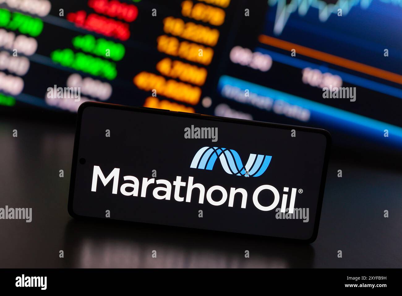 In this photo illustration, the Marathon Oil Corporation logo is ...
