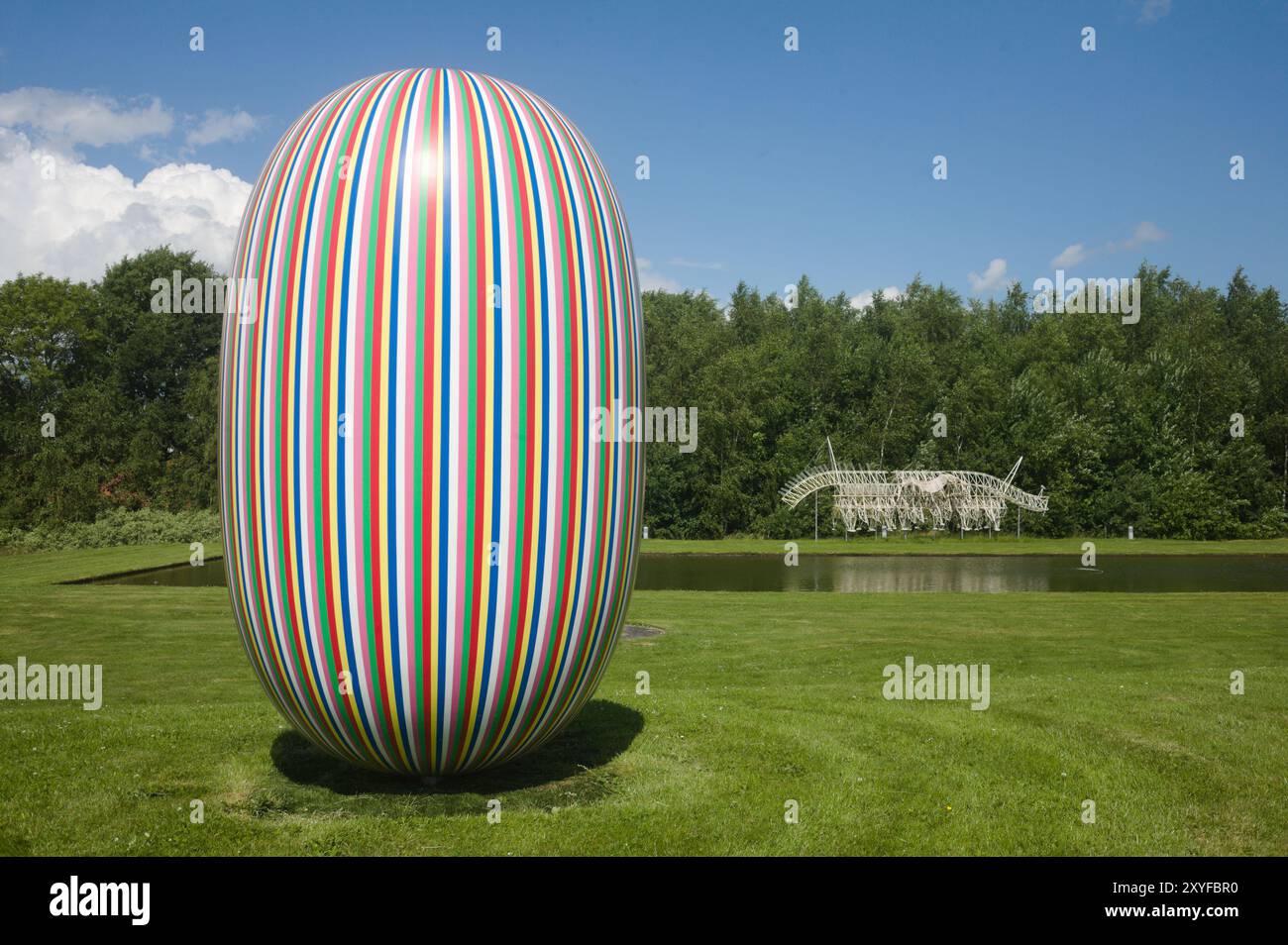 striped egg shaped object pond and strandbeest in grounds of Heart art ...