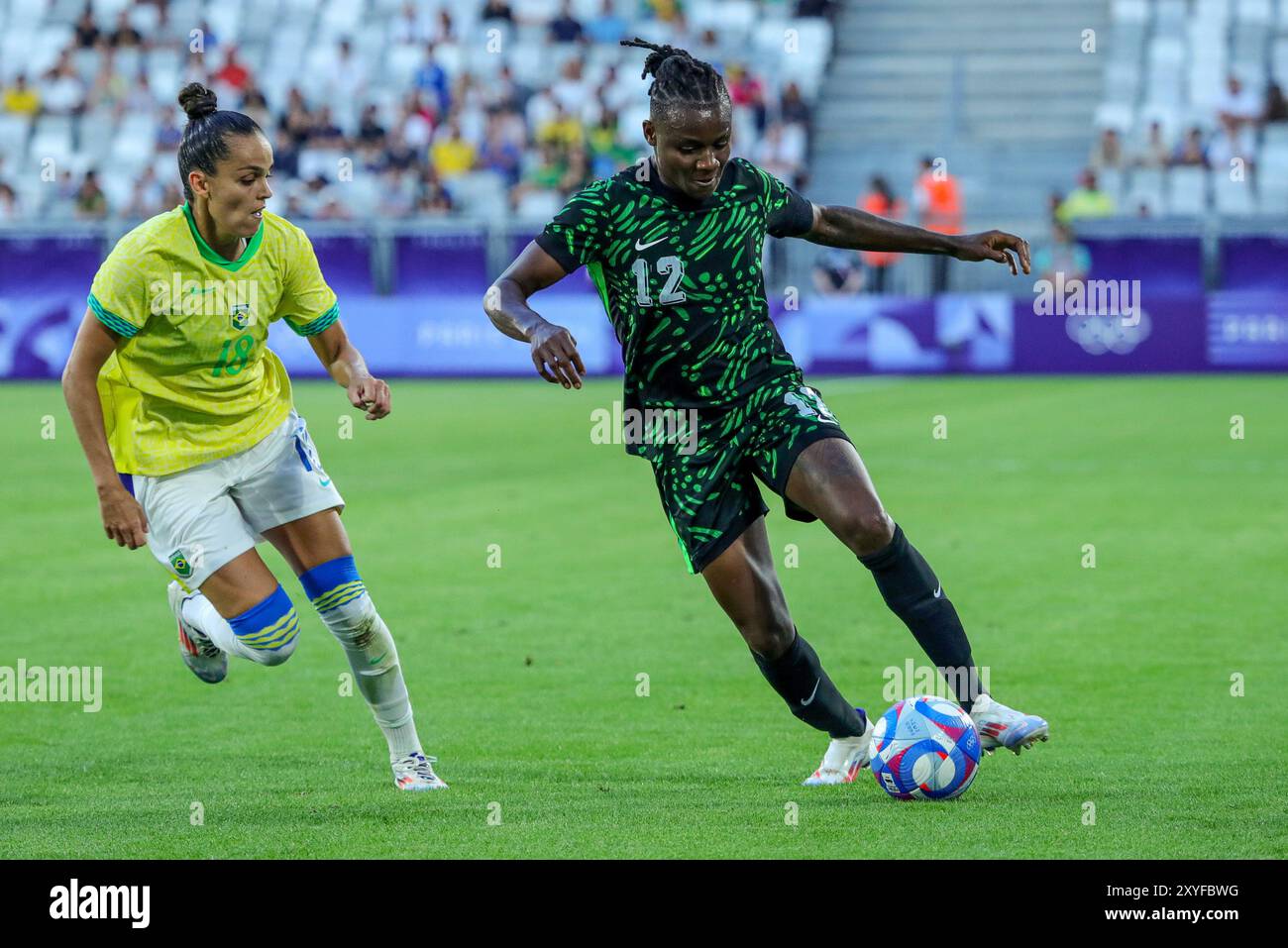 PARIS, FRANCE - JULY 25: Uchenna Kanu of Nigeria and Gabi Portiho of ...