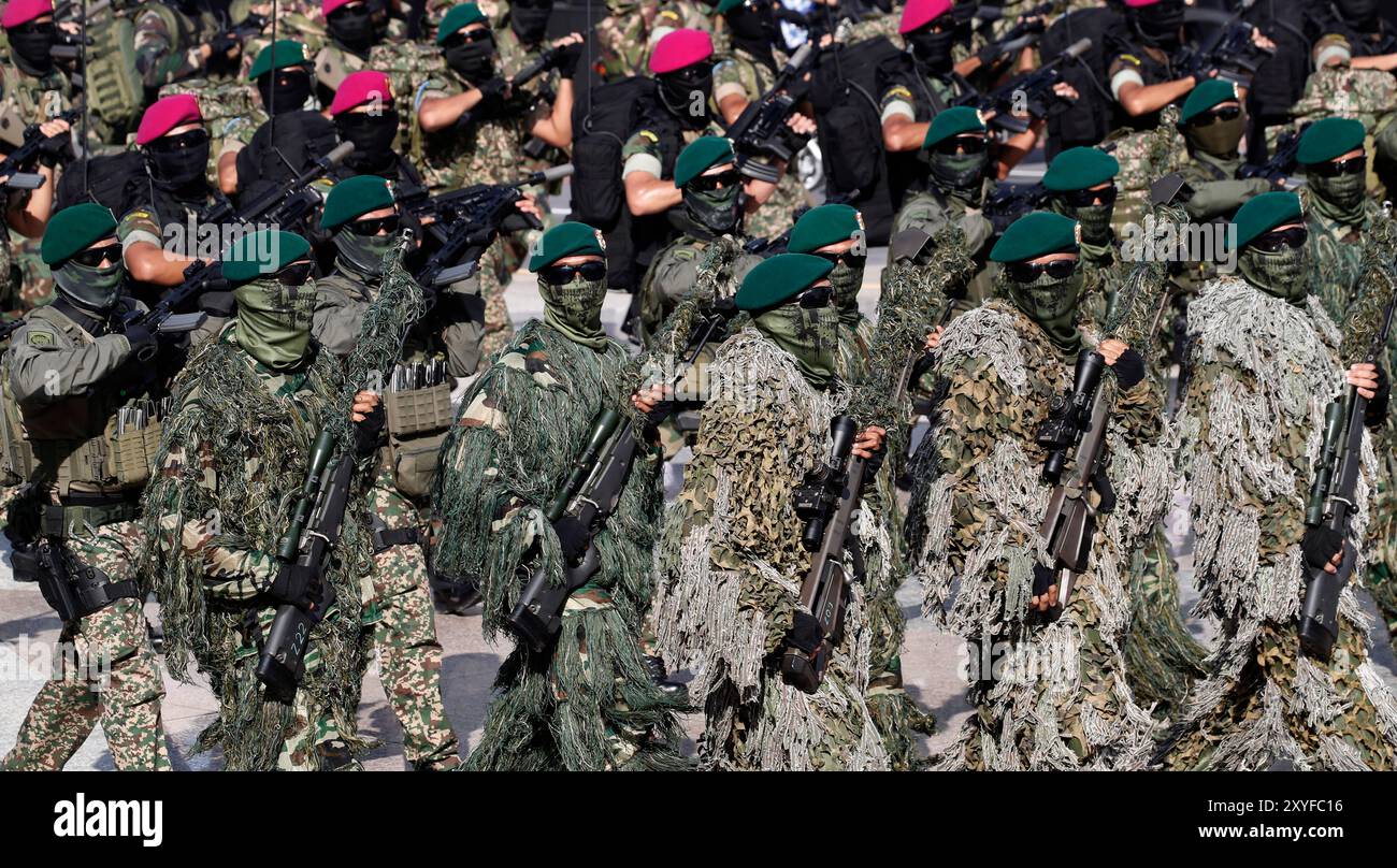 Kuala Lumpur, Malaysia. 29th Aug, 2024. Malaysian Armed Forces personnel march during the 67th ...