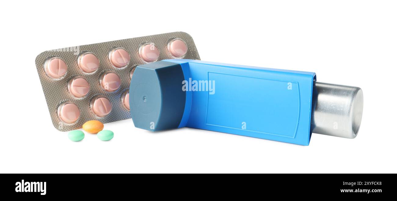 Asthma treatment. Inhaler and pills isolated on white Stock Photo - Alamy