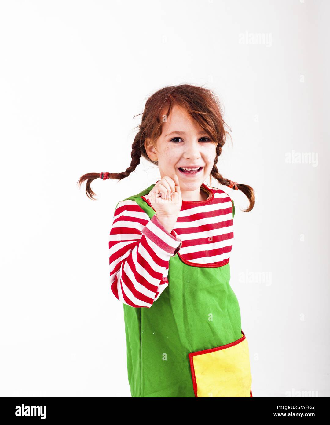 Little girl dressed as Pippi Longstocking with white background Stock ...