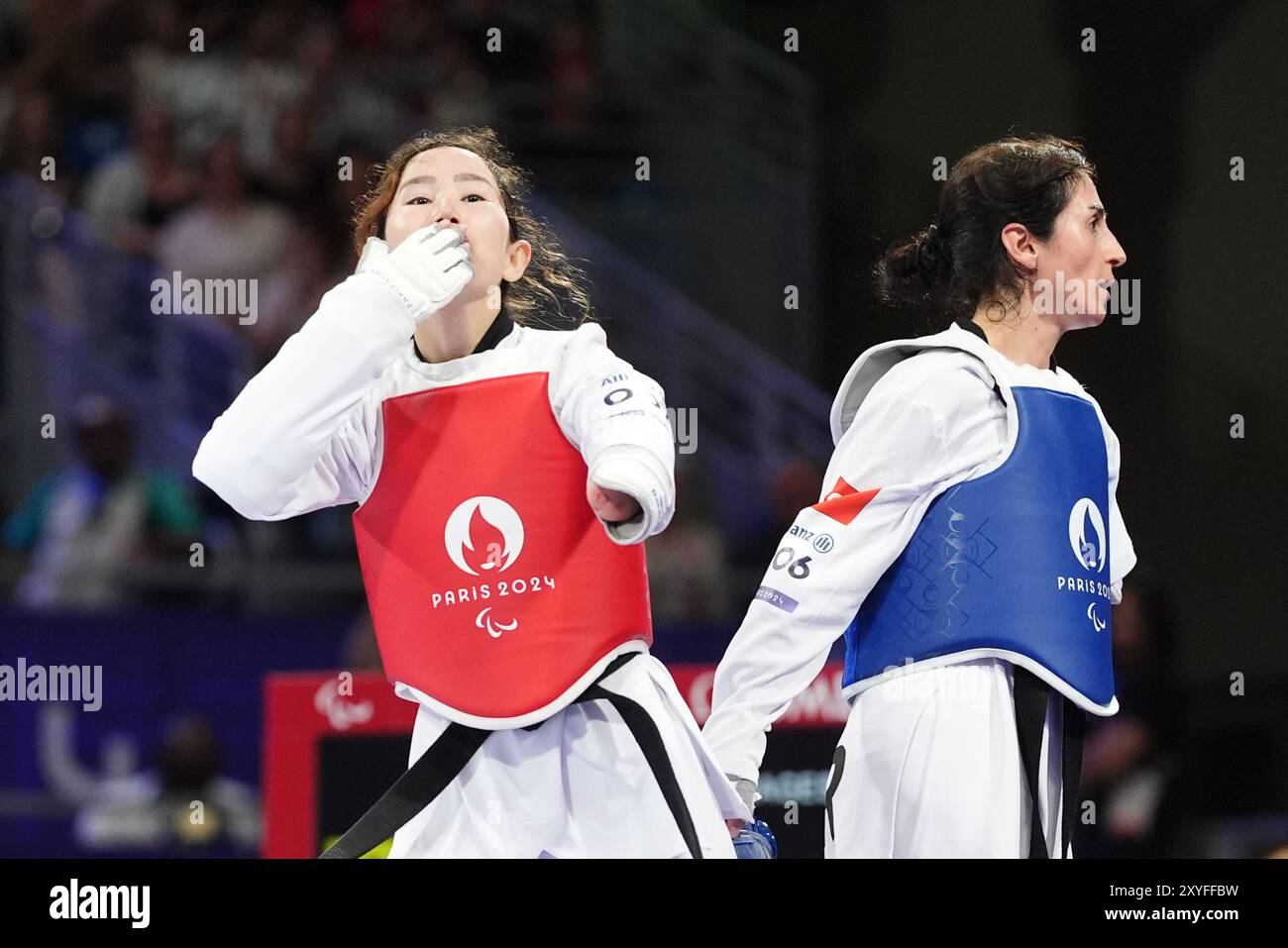 Refugee Paralympic Team's Zakia Khudadadi celebrates victory over ...
