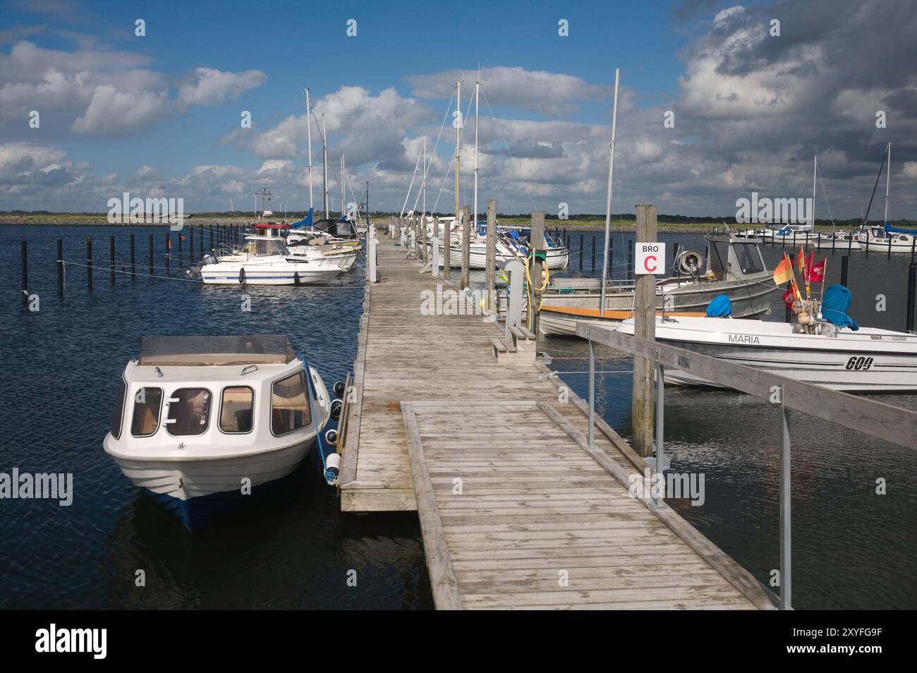 Floating pontoon with boats moored either side at Hanbjerg marina Stock ...