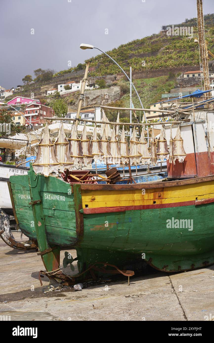 Fishing boat Sa Carneiro with codfish drying Stock Photo - Alamy