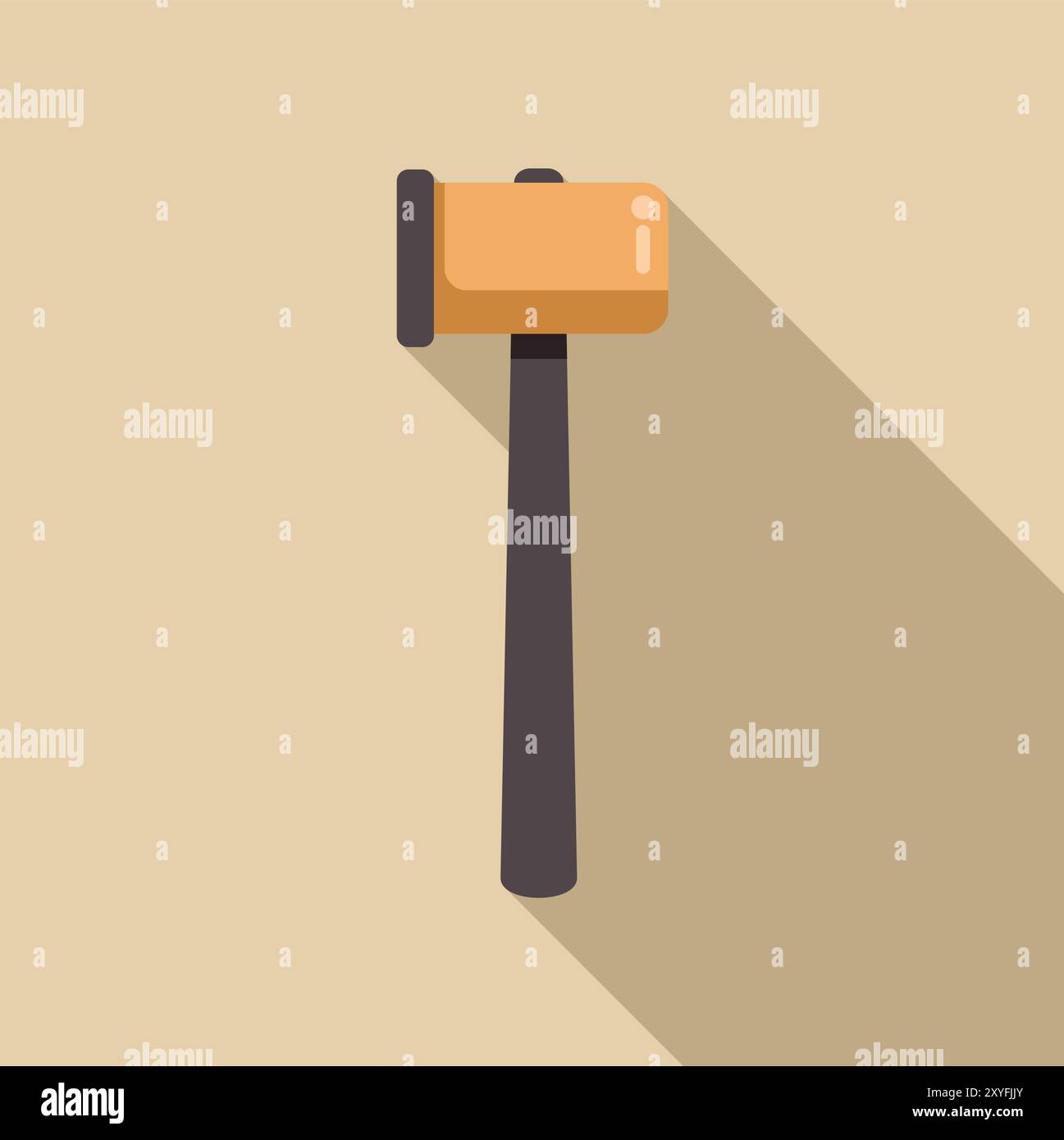 Rubber mallet with wooden handle casting long shadow on light brown ...
