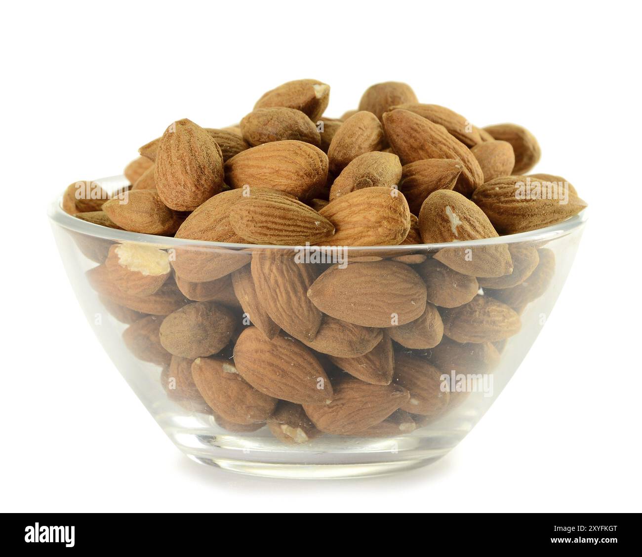 Small kitchen dish with almonds isolated on white Stock Photo - Alamy