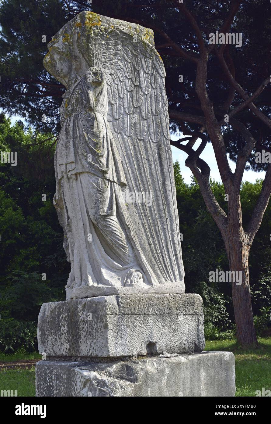 Sculptur, tree, figure of a woman, wings Stock Photo - Alamy