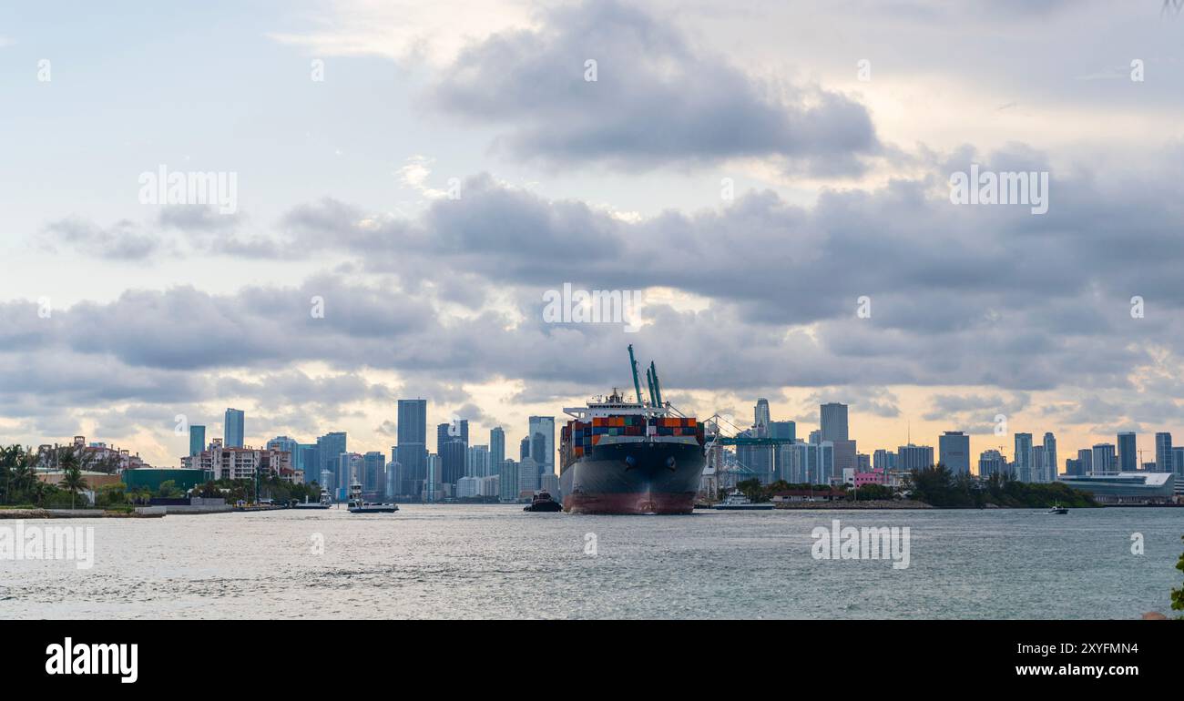 Cargo ship leaving harbor. Cargo business. Container ship. Shipping ...