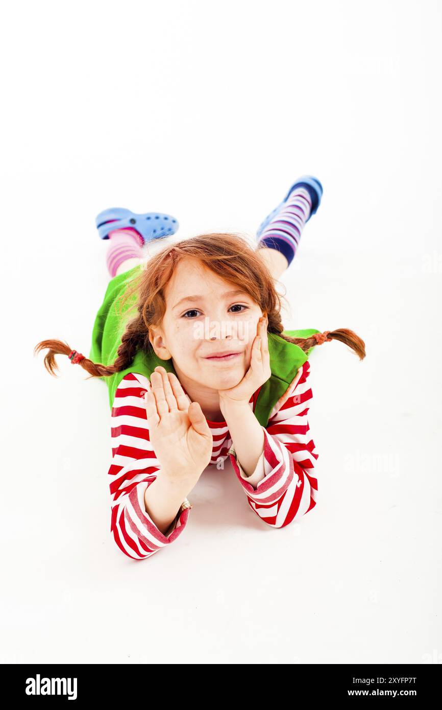 Little girl dressed as Pippi Longstocking with white background Stock ...