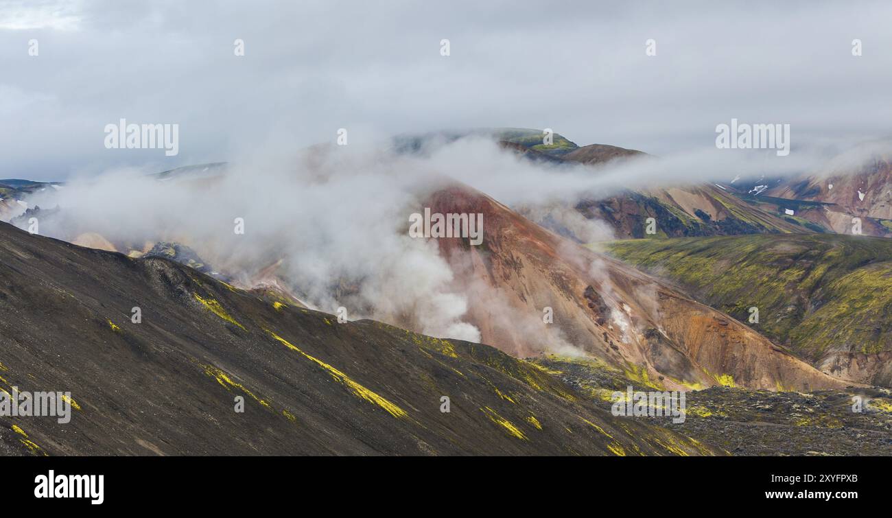 Mountain in Landmannalaugar in Iceland with steam coming from its side ...