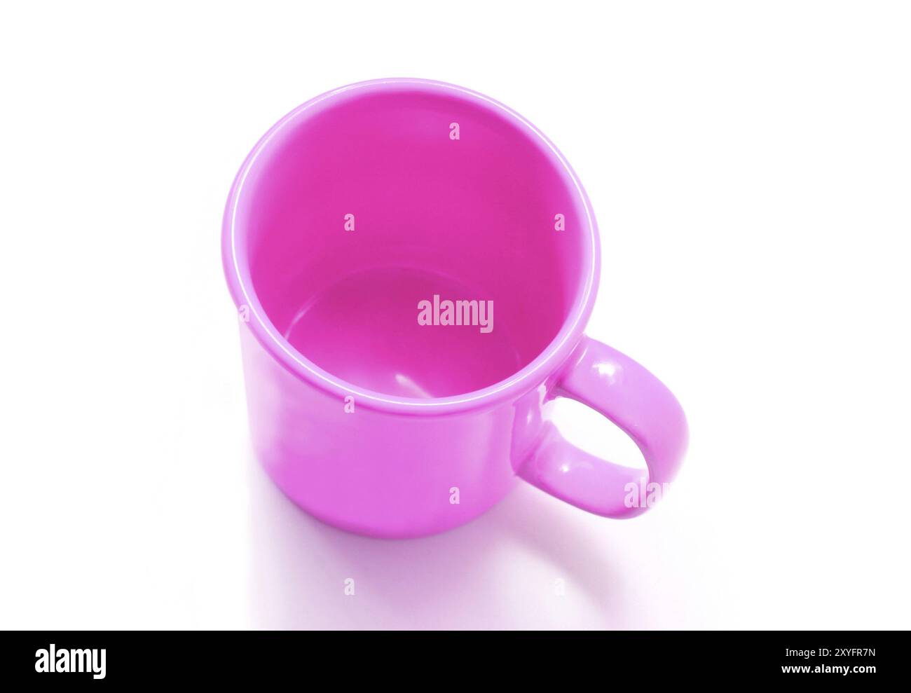 Pink mug on white background Stock Photo - Alamy
