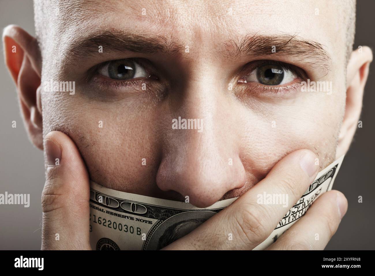 Human silence, dollar currency gag shut voiceless man mouth Stock Photo ...