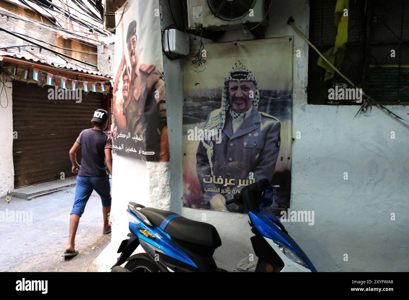 Beirut, Lebanon. 29th Aug, 2024. Portraits of Saddam Hussein and Yasser ...