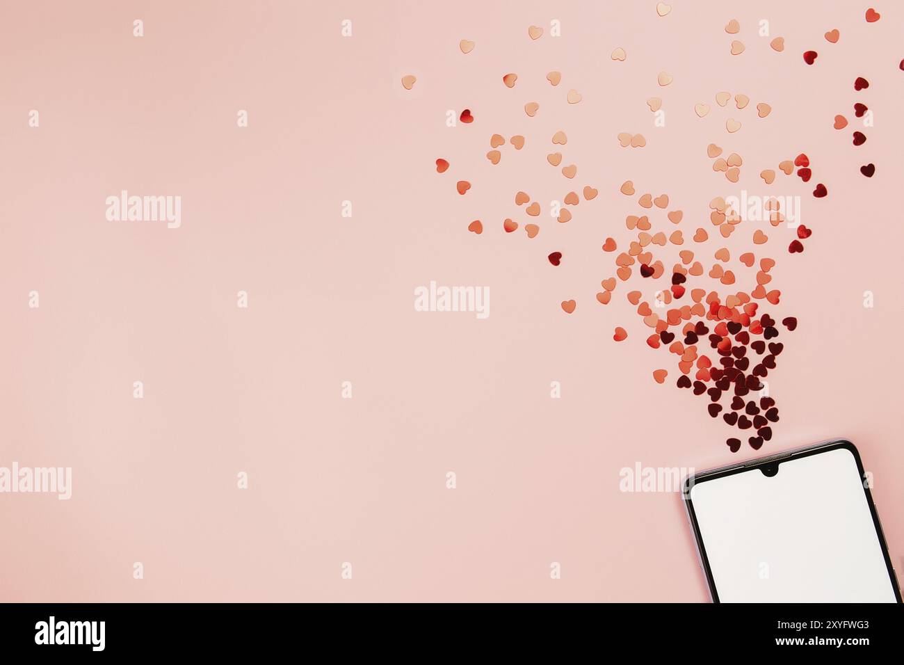 Valentine card with empty phone screen and glitters Stock Photo - Alamy