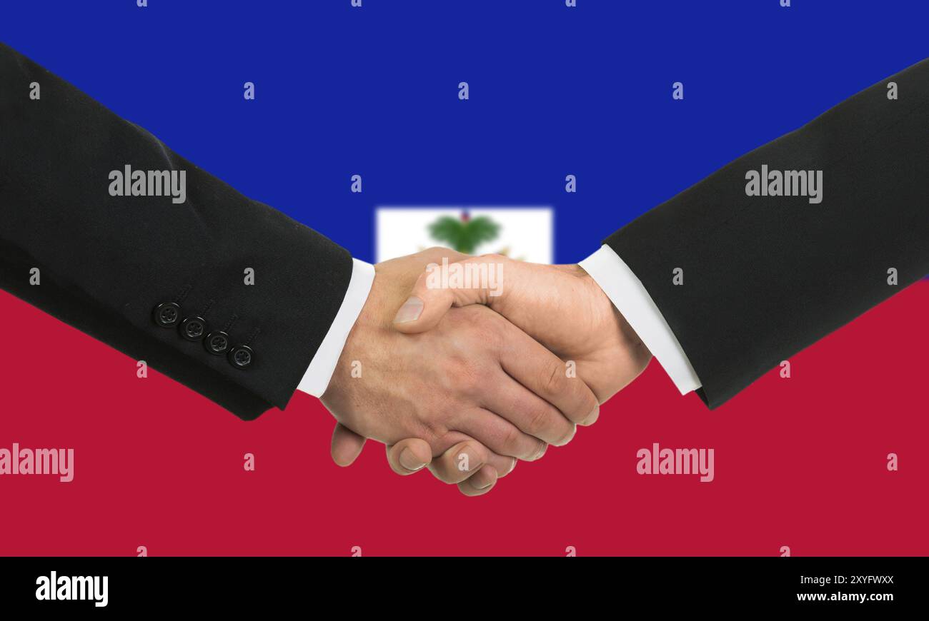 The Haiti flag and business handshake Stock Photo - Alamy