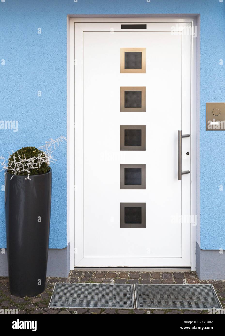 Modern front door on a new building Stock Photo - Alamy