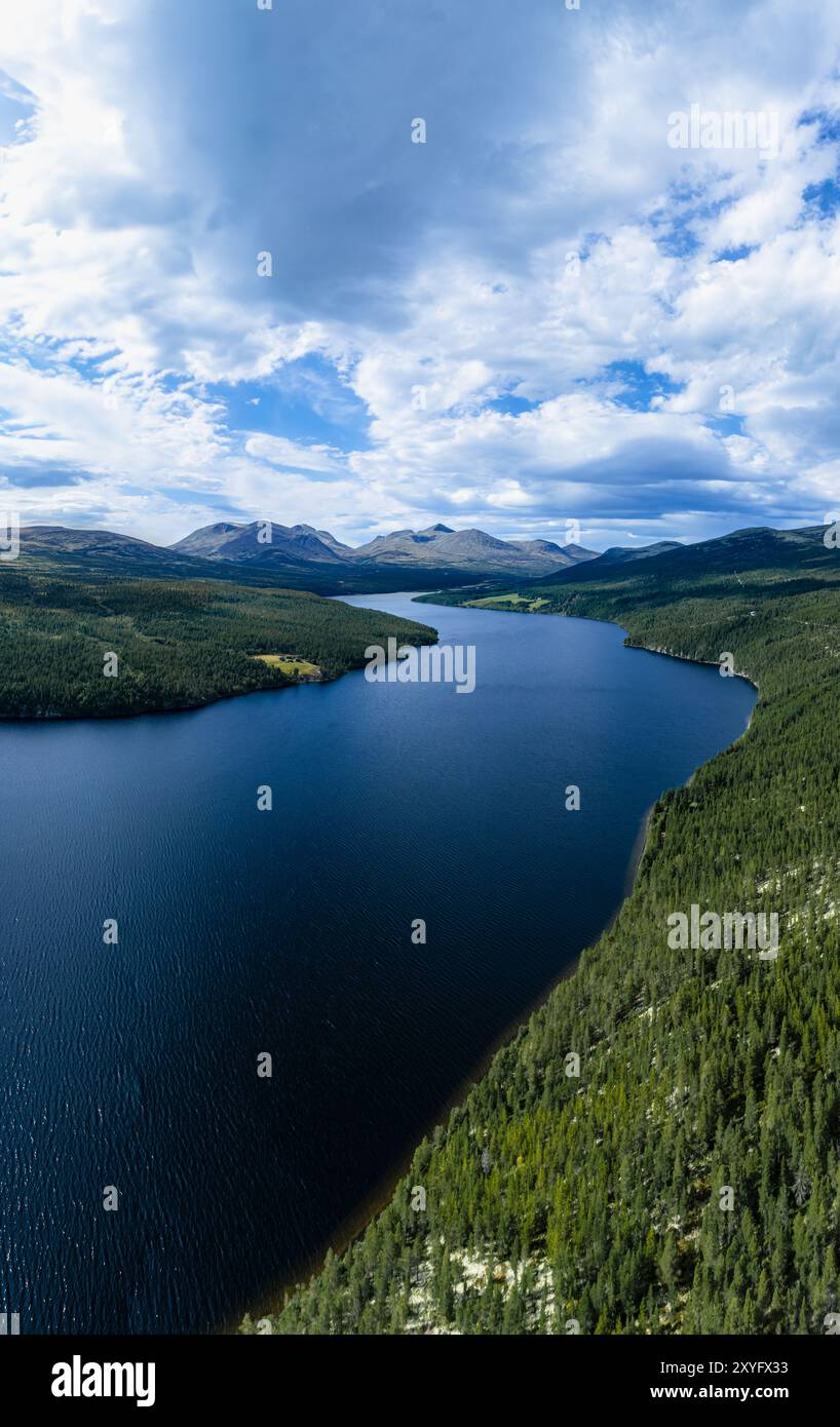 Aerial view of Atnsjøen lake surrounded by the majestic Rondslottet and ...