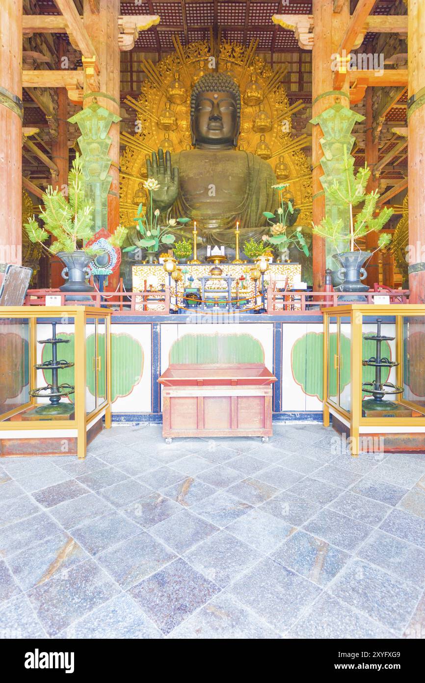Front of the centered largest bronze Daibutsu statue and altar inside ...