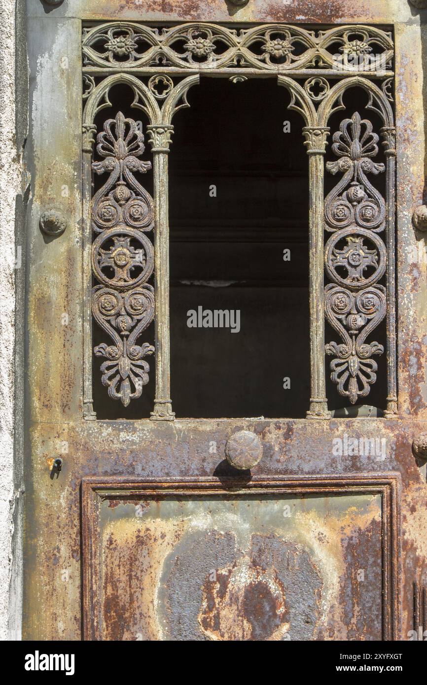 Rusty old iron door with ornamentation as background Stock Photo - Alamy