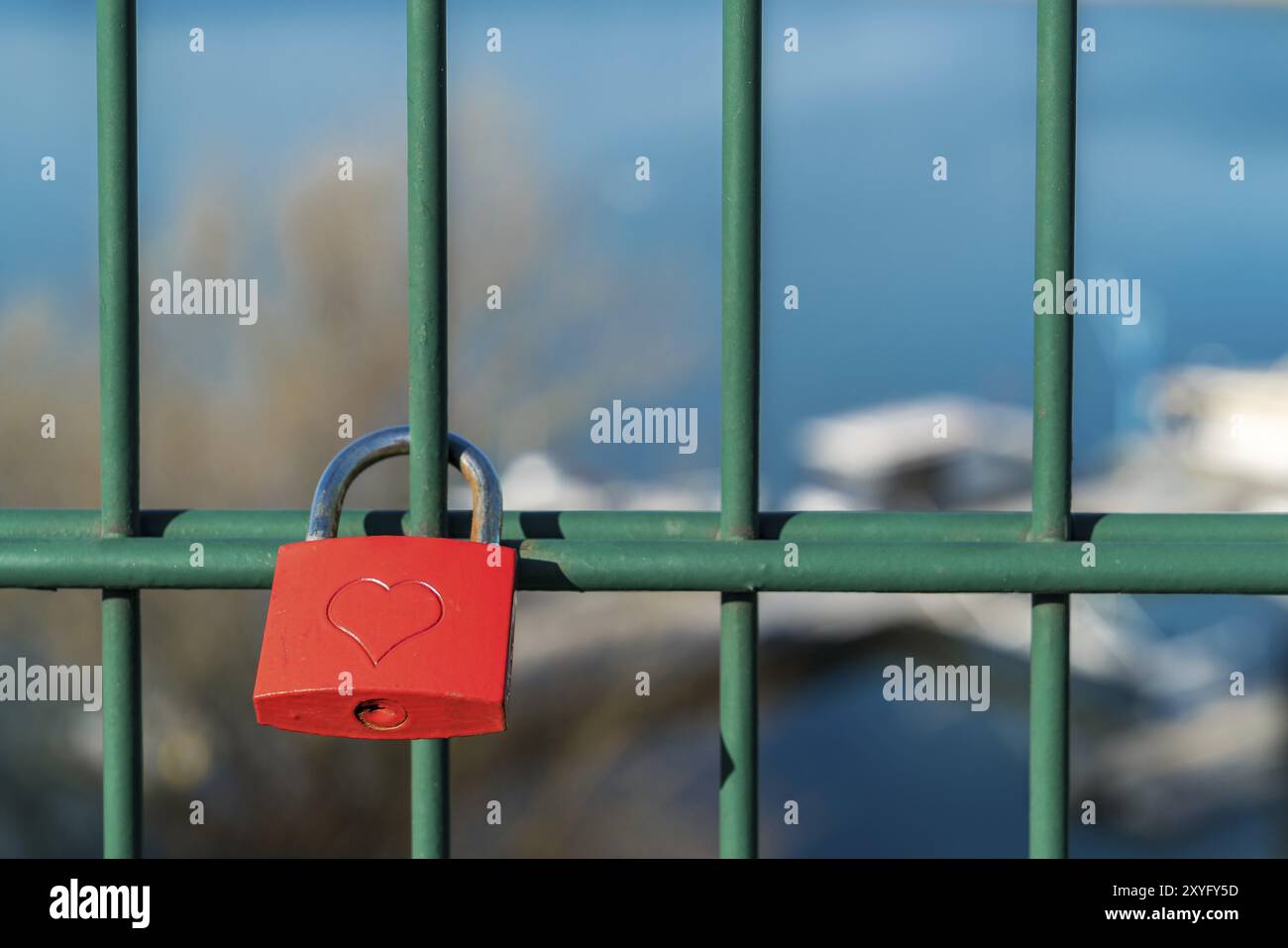 A Love lock on a gate with blurry background Stock Photo - Alamy