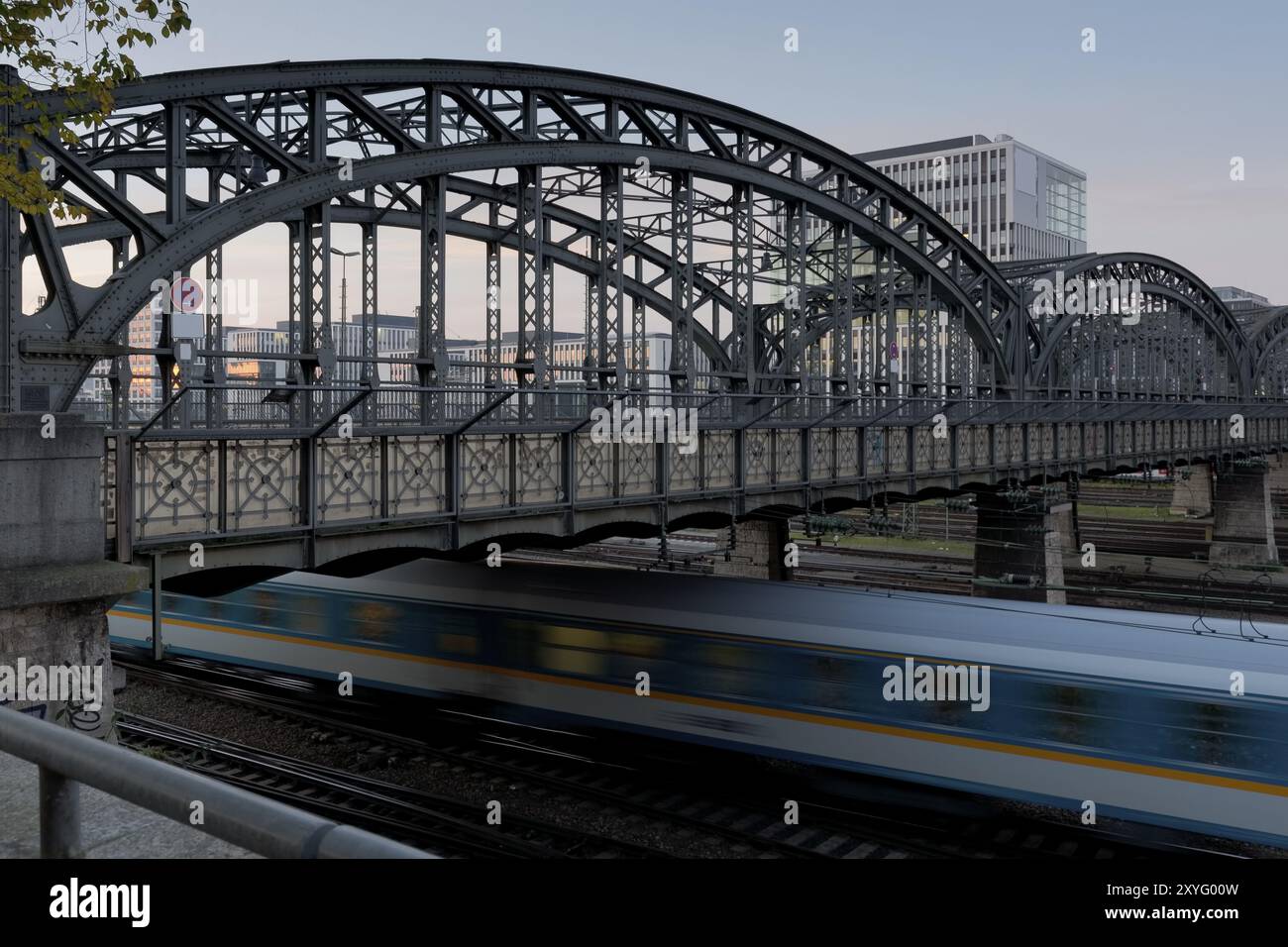 The Hackerbruecke in Munich at the golden hour with a moving train ...