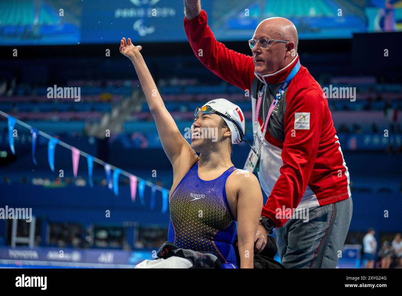 Paralympic athlete Pin Siu Yip, of Singapore, celebrates her victory at ...