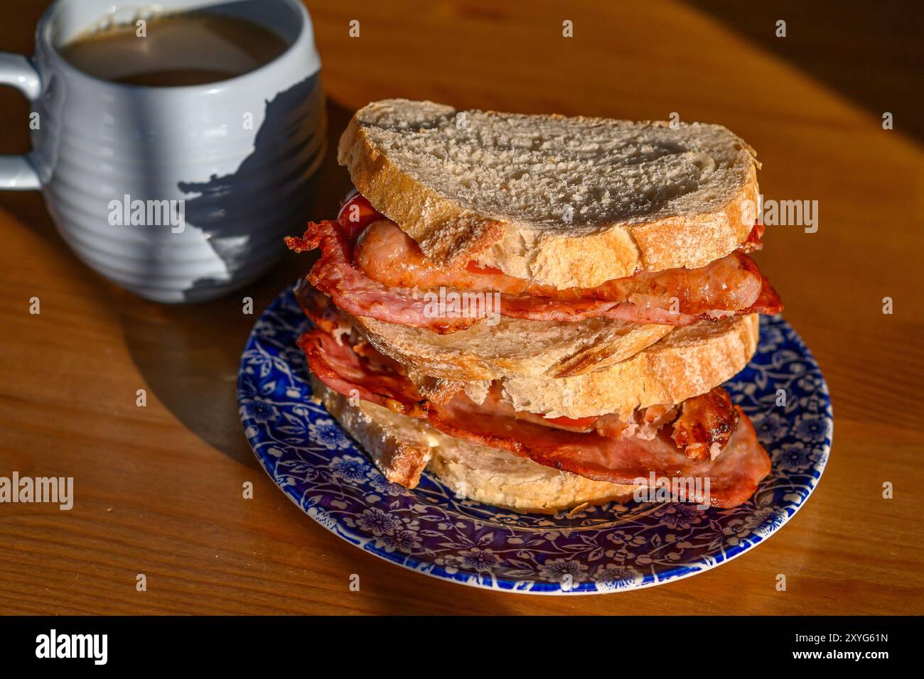 Sausage and Bacon Sandwich Stock Photo - Alamy
