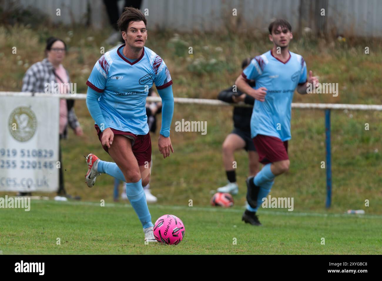 Actor Matt Lapinskas playing in a charity game for the family of ...