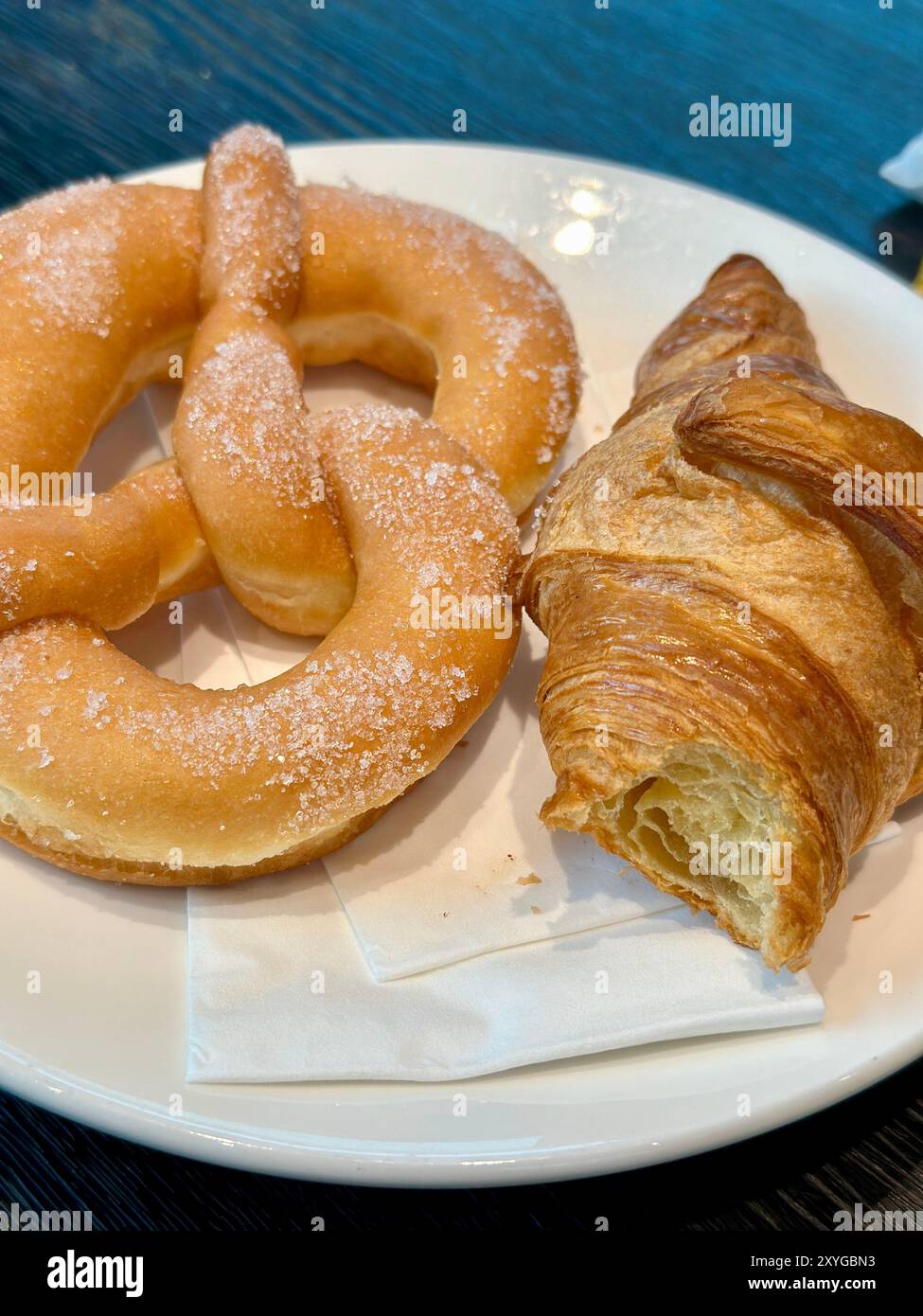Sugar pretzel and croissant Stock Photo - Alamy