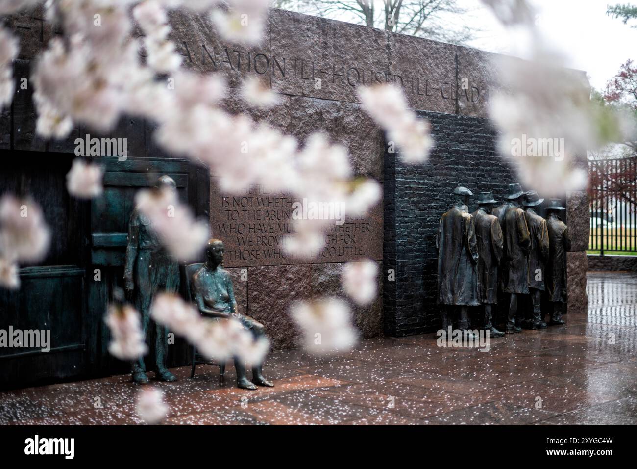 WASHINGTON DC — Cherry blossoms frame sculptures depicting the Great ...