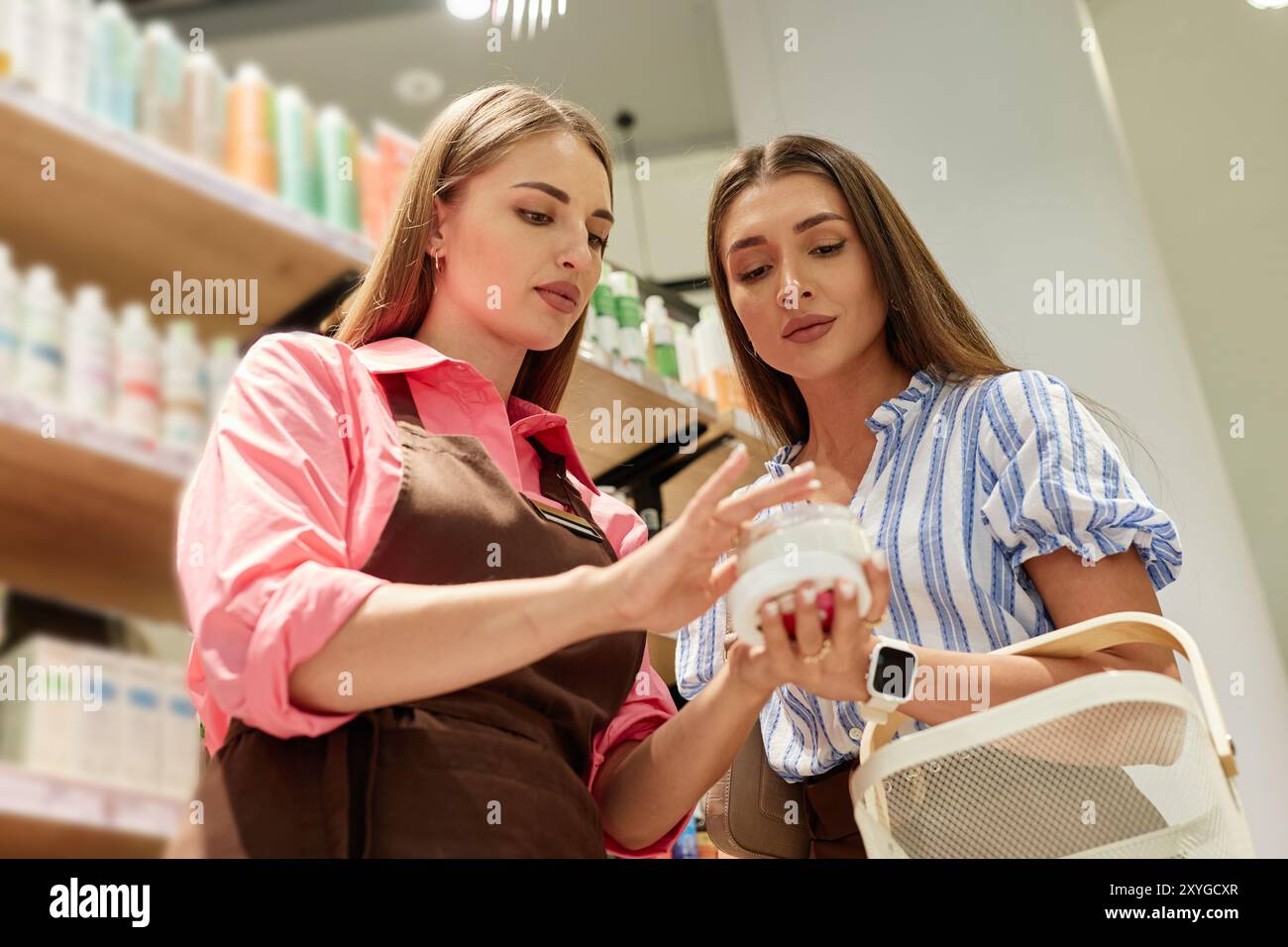 Cosmetic store assistant hi-res stock photography and images - Alamy