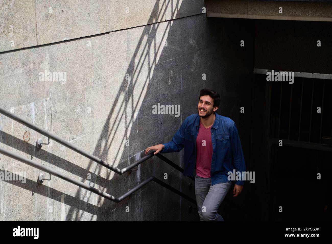 Handsome man coming out hi-res stock photography and images - Alamy