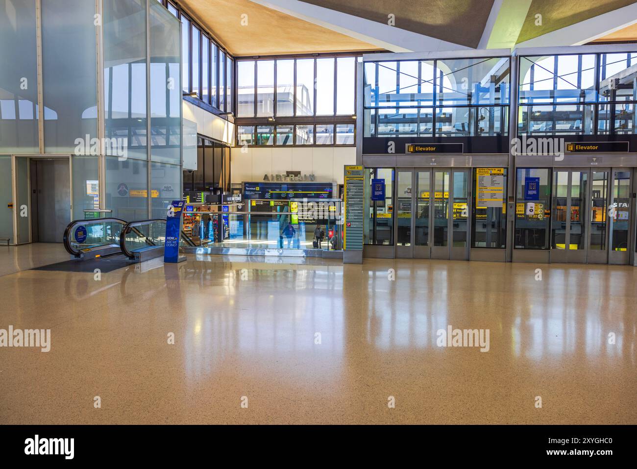 Interior of Newark Liberty Airport with a spacious corridor featuring ...
