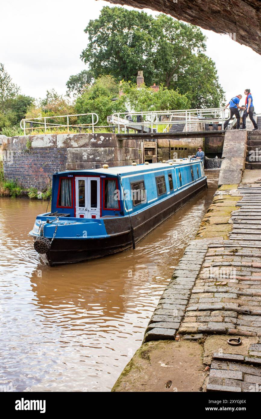Narrowboat leaving the double staircase twin locks on the Shropshire ...