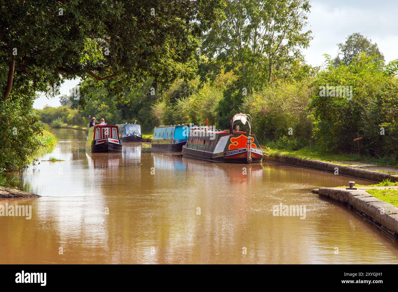 Canal narrowboat approaching Bunbury double staircase lock on the ...