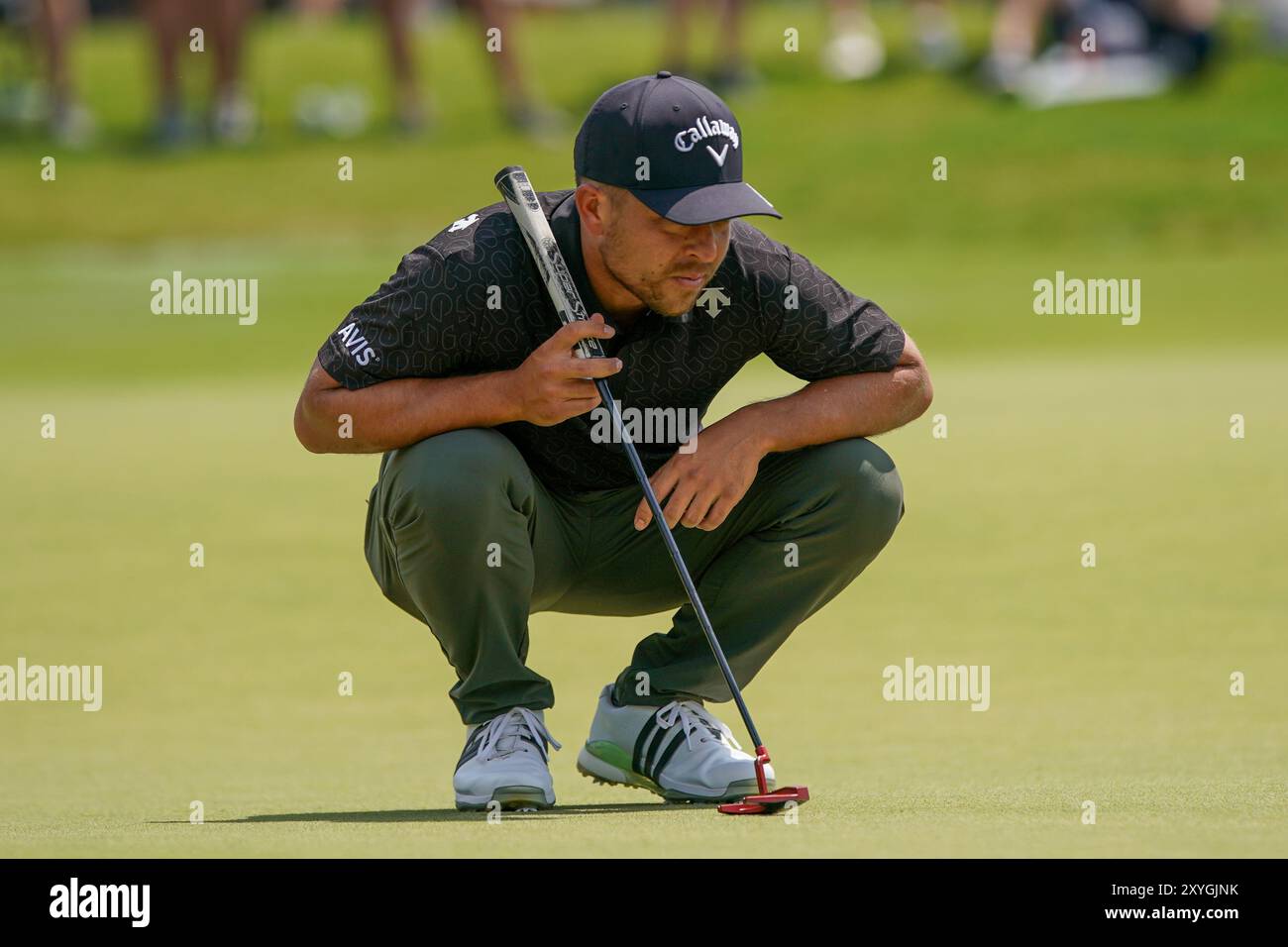 Atlanta, Georgia, USA. 29th Aug, 2024. Xander Schauffele (USA) lines up ...