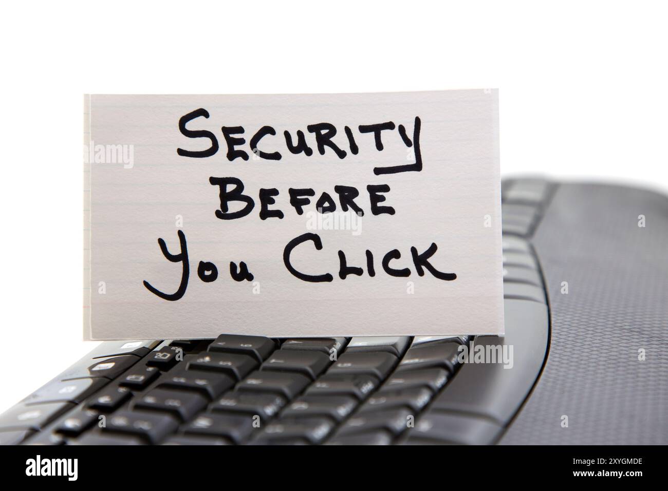 Handwritten warning sign on a keyboard reminds digital users to enable ...